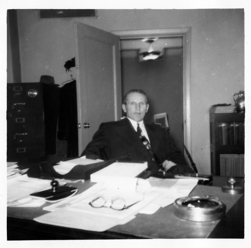 George H. Butler Sitting at Desk | Harry S. Truman