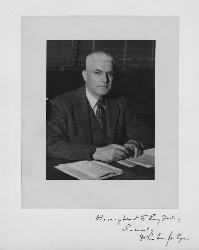 John Taylor Egan Sitting at Desk | Harry S. Truman