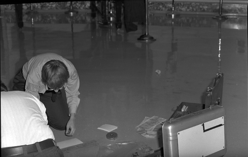 Photo of Inspection of Broken Case After Theft of Truman Library Swords ...