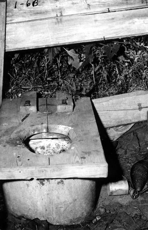 Children's outhouse interior at labor camp | Harry S. Truman