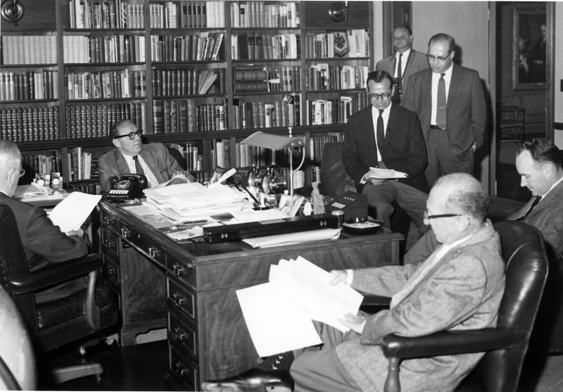 Men review scripts in Truman's office | Harry S. Truman