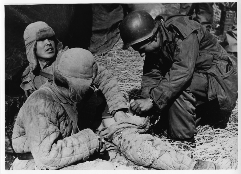 Soldier Tending to a Wounded Soldier | Harry S. Truman