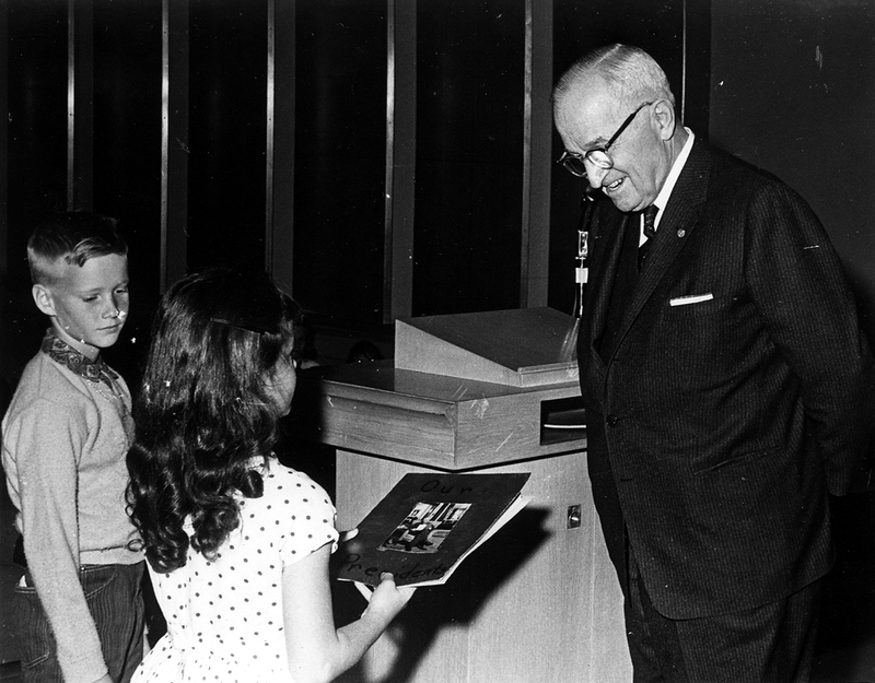 Children showing Truman a book | Harry S. Truman