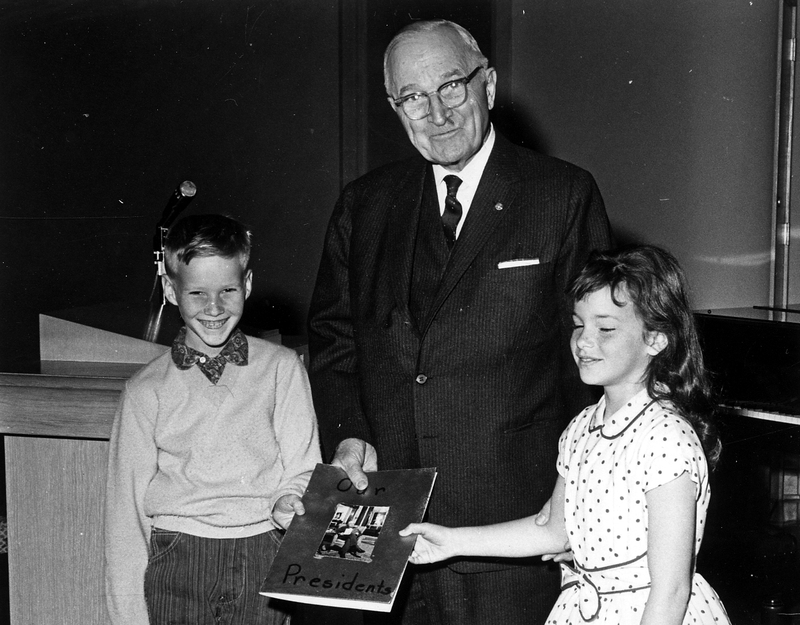 Truman with children and book | Harry S. Truman