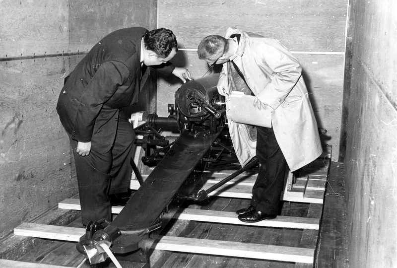 Men take a close examination of a 75mm gun | Harry S. Truman