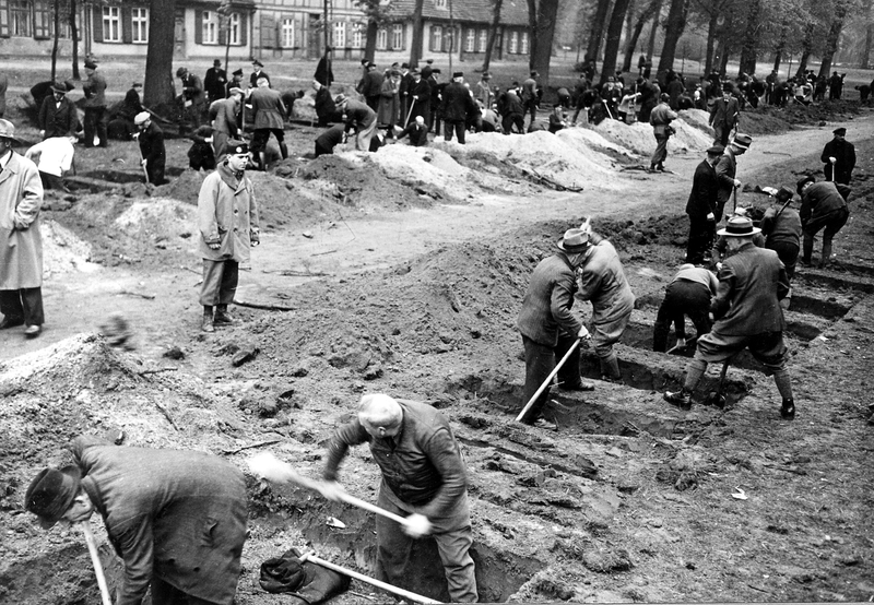 German citizens digging graves | Harry S. Truman