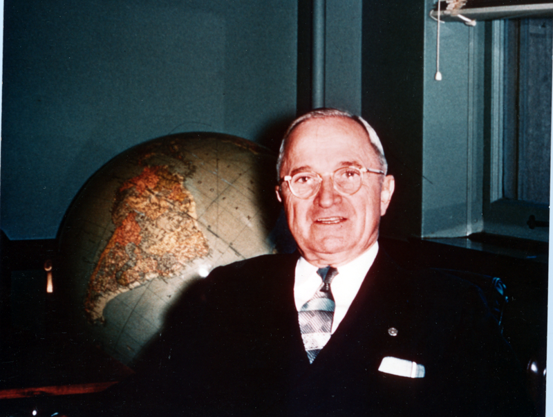 President Truman seated by globe in an office | Harry S. Truman