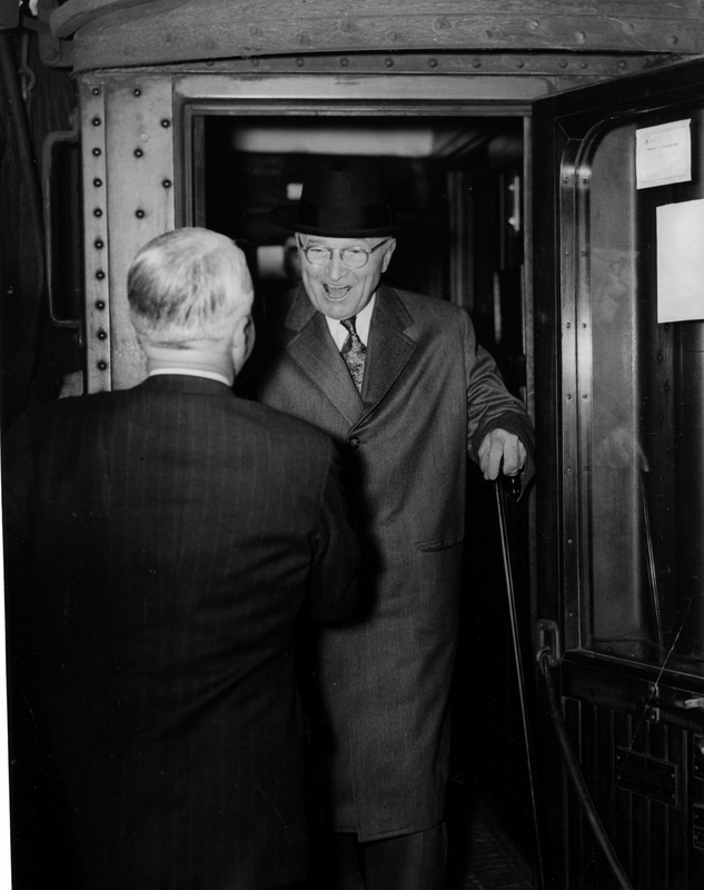 Former President Truman is greeted by Ambassador Freeman Matthews ...