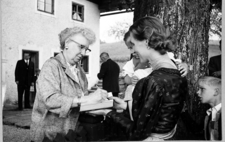 Mrs. Truman Signs an Autograph in Salzburg, Austria | Harry S. Truman