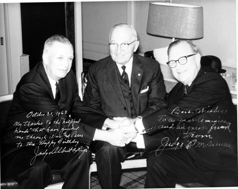 A signed color photo showing former President Truman seated with two ...