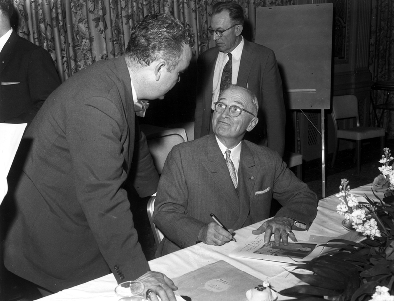 Truman signing an autograph | Harry S. Truman