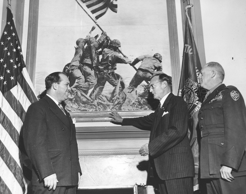 Paul H. Griffiths and Others in Front of a Painting of the Flag Raising ...