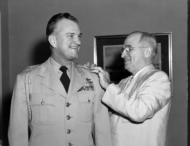 President Truman pins the 2-Star insignia on his Air Force Aide ...