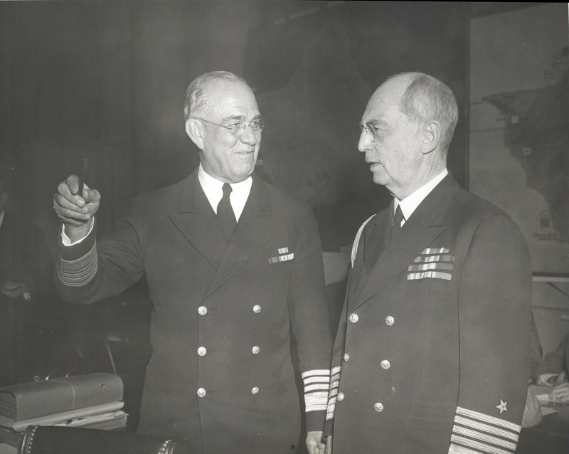 Photo of Admiral William D. Leahy (R) talking to Admiral James O ...