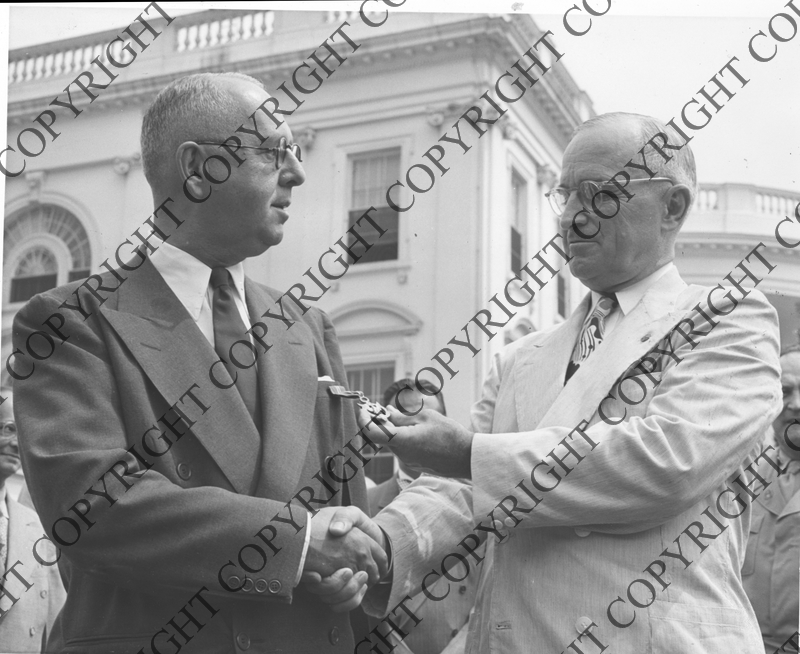 President Harry S. Truman awards the Medal of Merit to David K. Niles ...