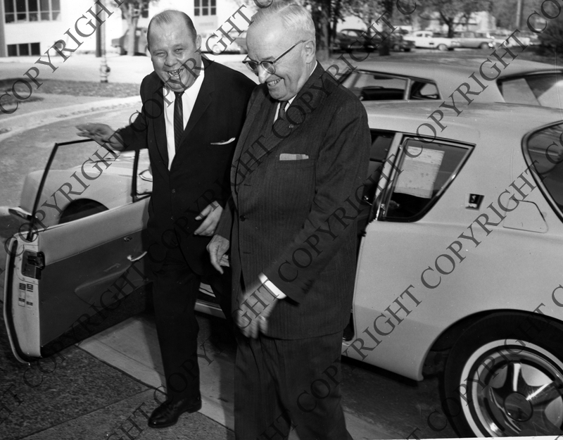 Former President Harry S. Truman and Fred D. Whitaker in front of a ...