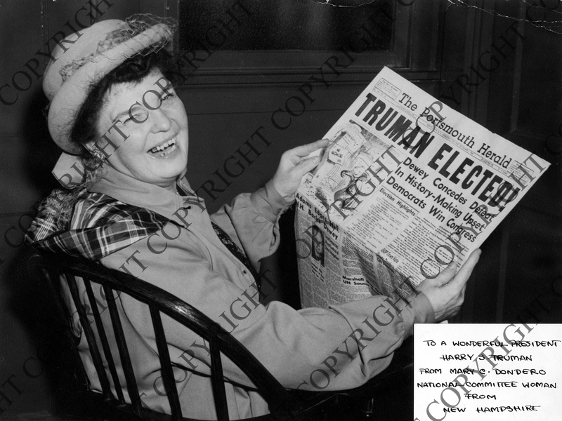 Woman with "Truman Elected" newspaper | Harry S. Truman