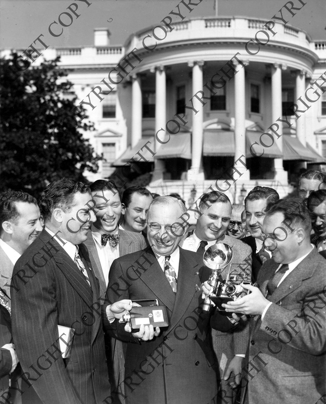 President Truman holding a camera | Harry S. Truman