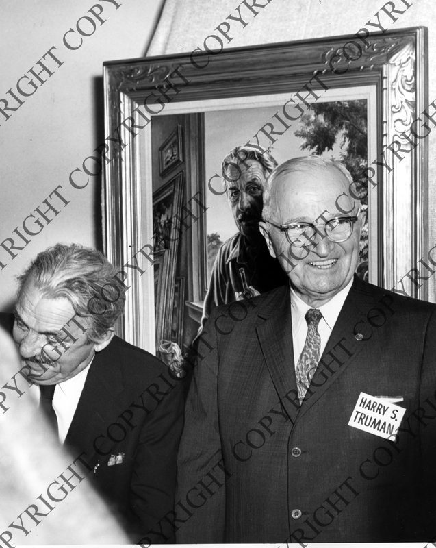Thomas Hart Benton standing near his portrait with former President ...