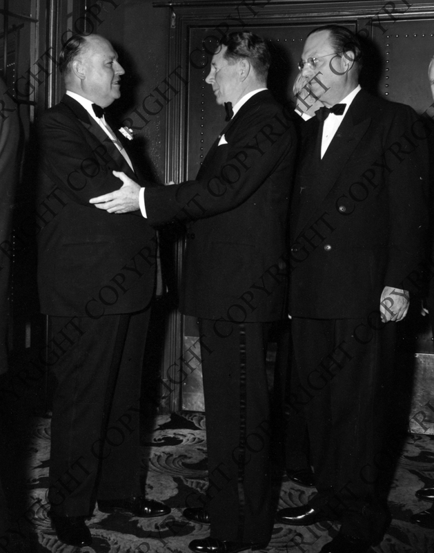 John L. Sullivan (center) and two unidentified men all in formal dress ...