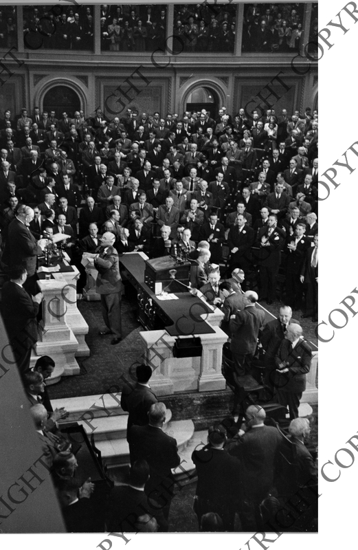 President turns to face those behind him as members of the 80th ...