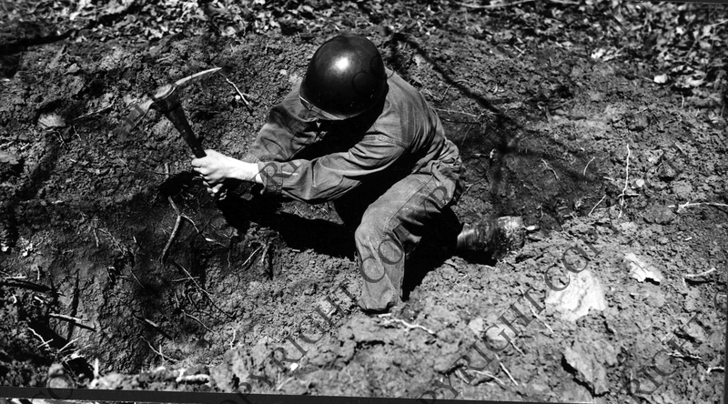 Trainee digging foxhole during training at Fort Knox | Harry S. Truman