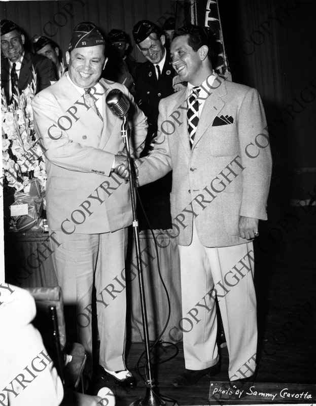 Paul Griffith, National Commander of the American Legion, shakes hands ...