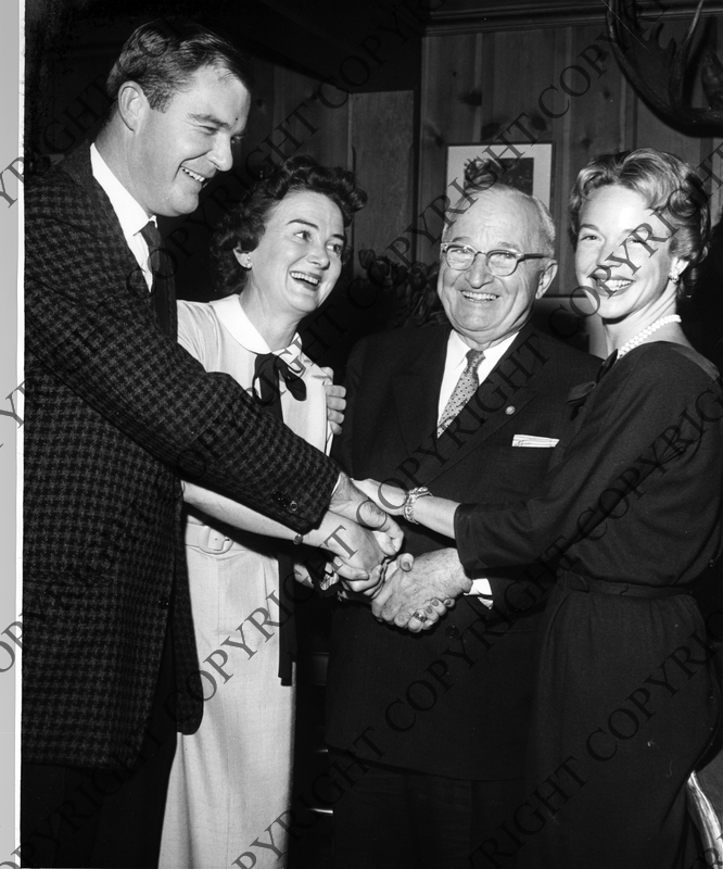 Former President Truman shaking hands with Mrs. Pauley and two ...